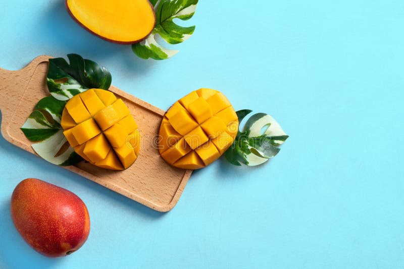 Mango Background Design Concept. Top View Diced Fresh Mango Fruit on ...