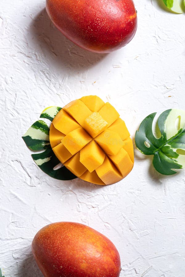 Mango Background Design Concept. Top View Diced Fresh Mango Fruit on ...