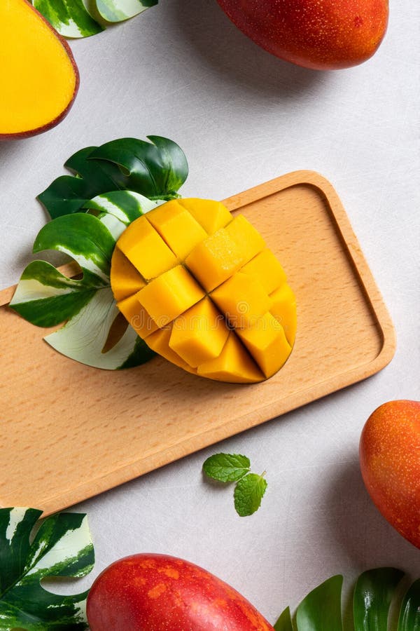 Mango Background Design Concept. Top View Diced Fresh Mango Fruit on ...