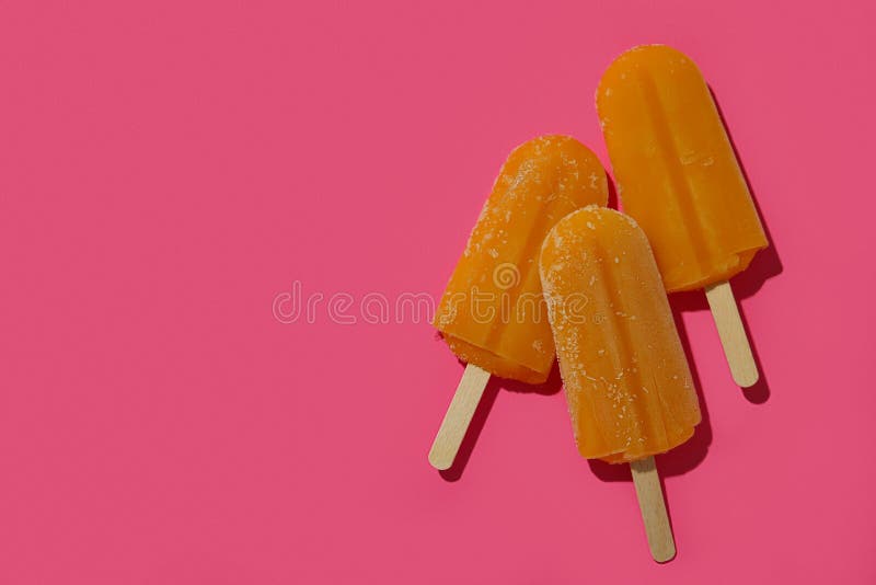 Mango or Caramel Ice Cream Sticks on Pink Background Stock Photo ...