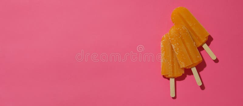 Mango or Caramel Ice Cream Sticks on Pink Background Stock Photo ...