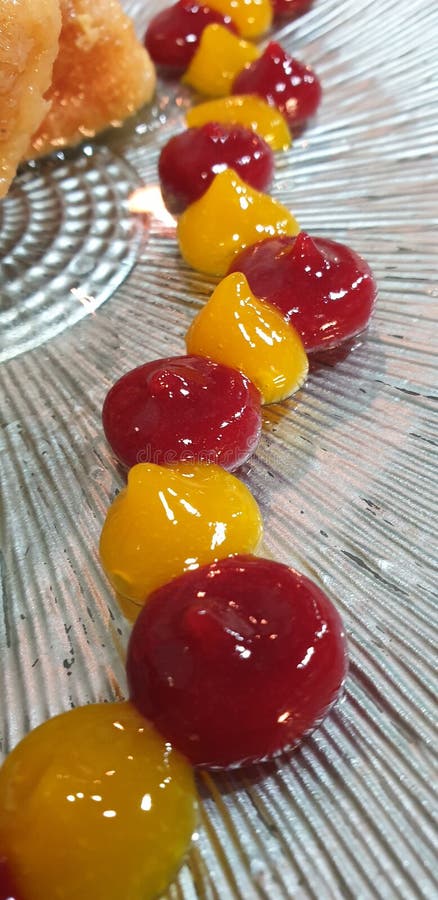 Mango and cherry coulis stock photo. Image of cherry - 176489216