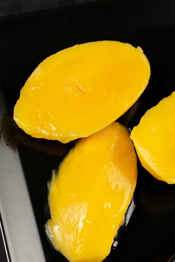 Mango Compote Served on the Plate with Fork Stock Photo - Image of ...