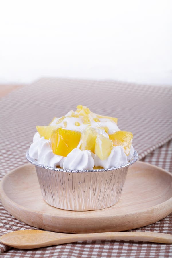 Mango Cupcake with Coconut Milk Stock Photo - Image of flower ...