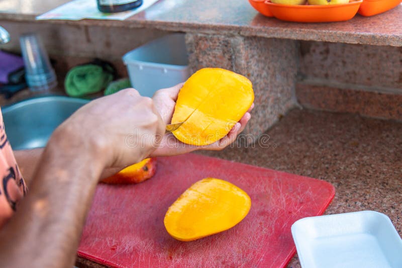 Mango Cutting in the Kitchen. Selective Focus Stock Photo - Image of ...