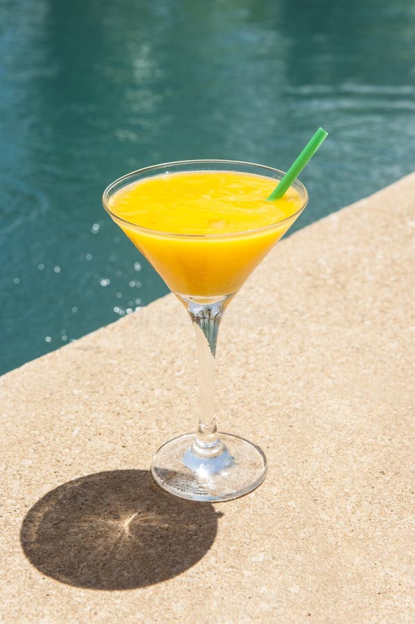 Mango Daiquiri by the Pool stock photo. Image of martini - 148671846
