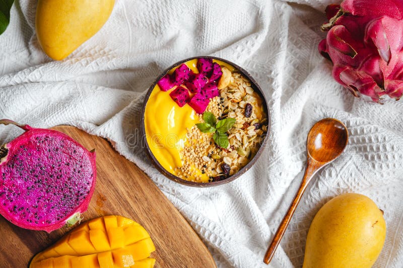 Mango and Dragon Fruit Smoothie Bowl Stock Photo - Image of shell ...