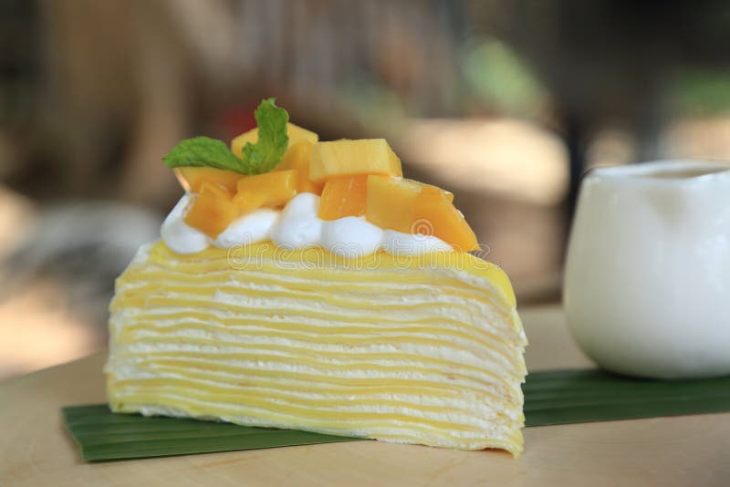 Mango Fruit Crape Cake with Fresh Mango Piece on Top Stock Image ...