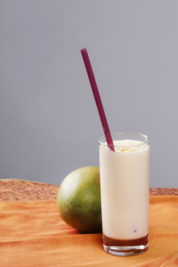 Mango Fruit and Glass of Cold Lassi Drink on the Table Stock Photo ...