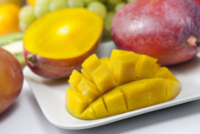 Mango and Fruits on the Plate Closeup Stock Image - Image of open ...