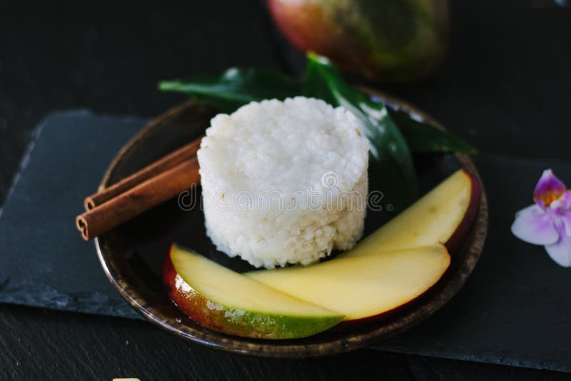 Mango Fruits with Rice Over Ceramic Plate. Stock Image - Image of vegan ...
