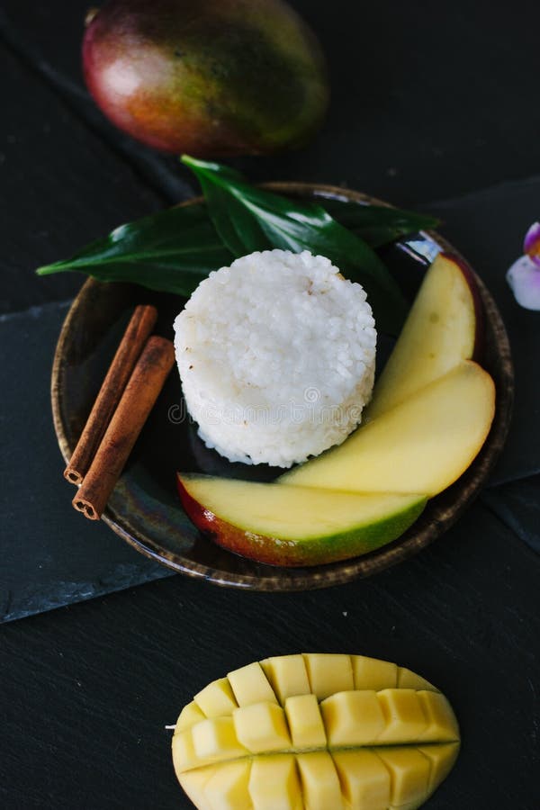 Mango Fruits with Rice Over Ceramic Plate. Stock Photo - Image of ...