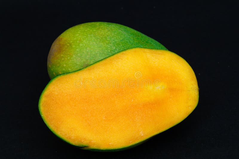 Manggo Harumanis Slice Isolated on Black Stock Photo - Image of heap ...