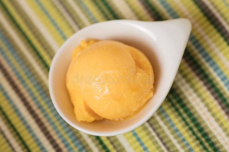 Mango Ice Cream Ball or Mango Sorbet Stock Image - Image of scoop ...