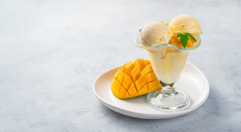 Mango Ice Cream and Fresh Mango on a Gray Background. Stock Image ...