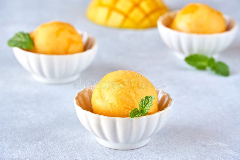 Mango Ice Cream Sorbet with Mint Leaves and Mango Fruit Stock Photo ...