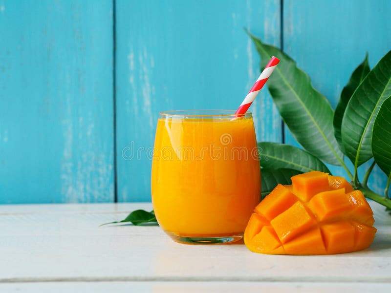 Mango Juice Served with Fresh Ripe Mango Sliced Stock Image - Image of ...