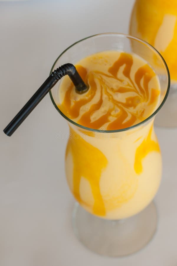 Mango Lassi Or Smoothie In Big Glass Or Small Bottles With Curd, Cut ...