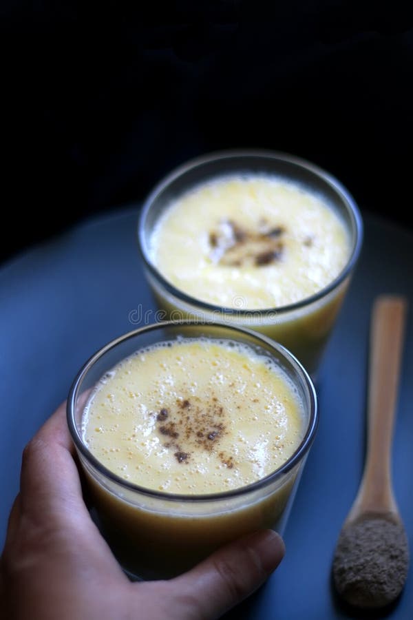Mango Lassi stock image. Image of hand, background, field - 152096991