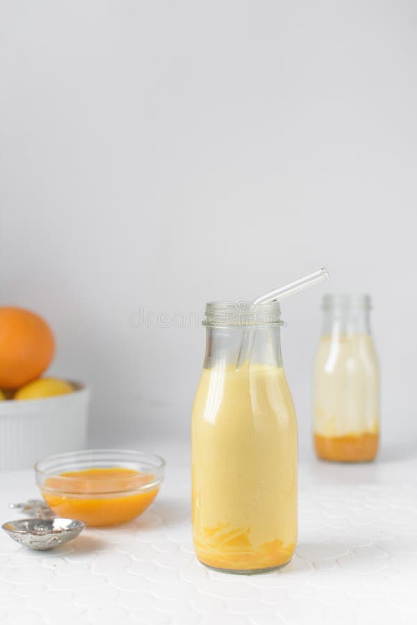 Mango Milk in a Classic Milk Bottle, Mango Puree and Whole Milk in a ...