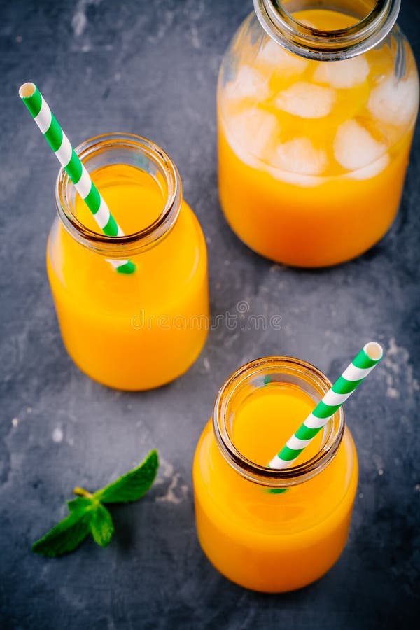 Mango Orange Lemonade with Ice and Mint Stock Photo - Image of food ...