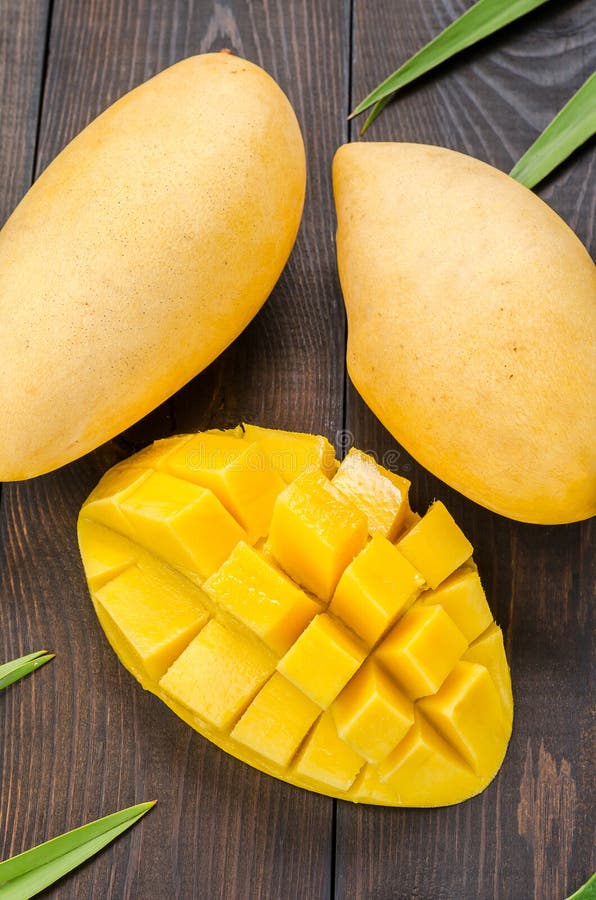 Mango on palm leaves. stock image. Image of mango, front - 143914517