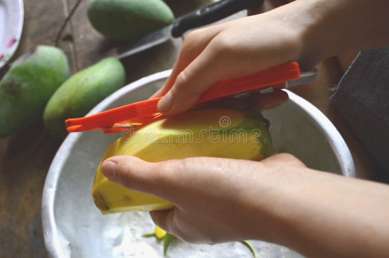 Mango,peeling Mango, Mango Ekiiweswi Stock Photo - Image of healthy ...