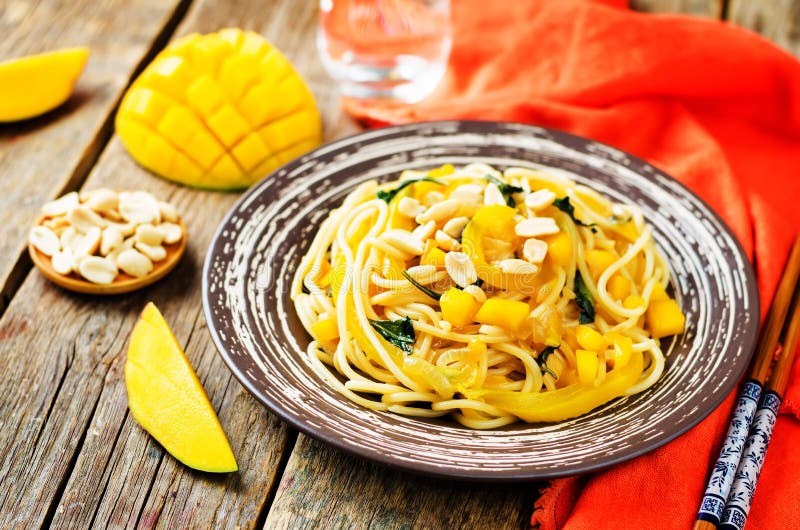 Mango Pepper Peanut Pasta with Fresh Mango Slices Stock Photo - Image ...