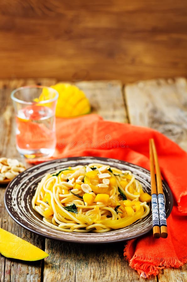 Mango Pepper Peanut Pasta with Fresh Mango Slices Stock Image - Image ...