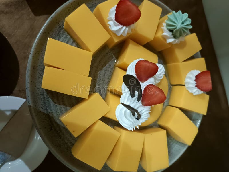 Mango Pudding with Flan and Strawberry Sauce Stock Photo - Image of ...