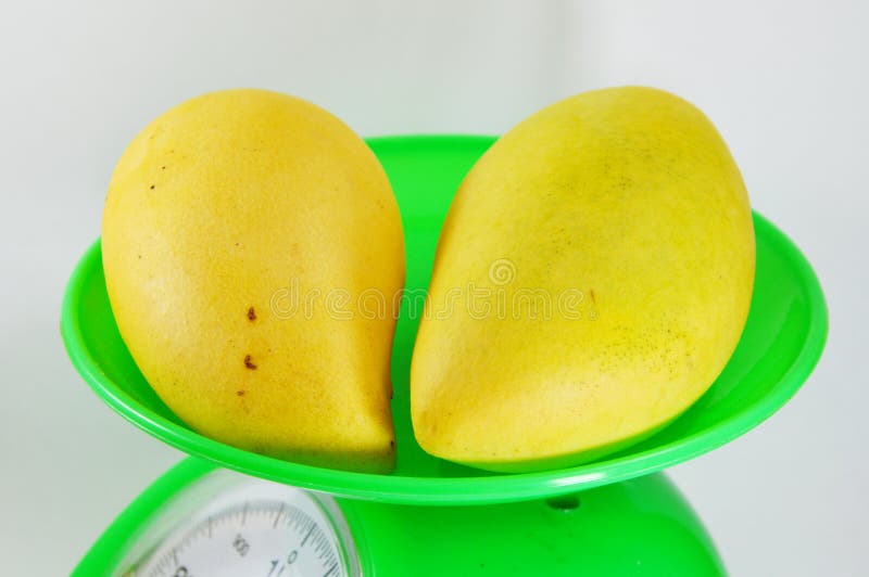 Mango Green Weighting Scale Stock Photos - Free & Royalty-Free Stock ...