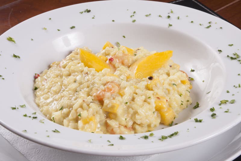 Mango risotto stock photo. Image of risotto, herbs, rice - 63981764