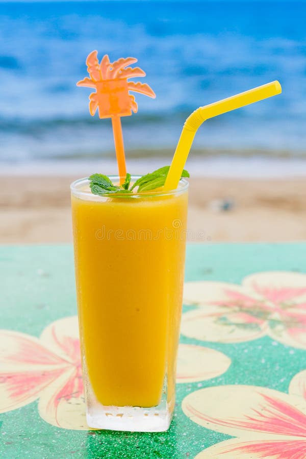 Mango Shake with Straw on the Tropical Beach Stock Photo - Image of ...