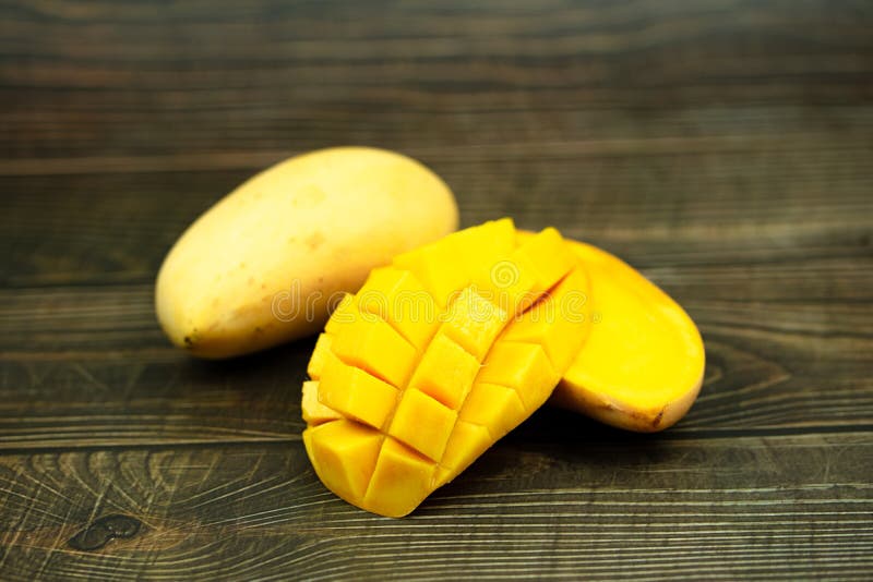 Mango Shoots in Brown Background. Stock Photo - Image of mango, fruit ...