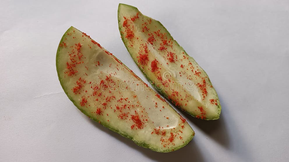 Mango Slices Adding Chili Power and Salt. Stock Image - Image of ...