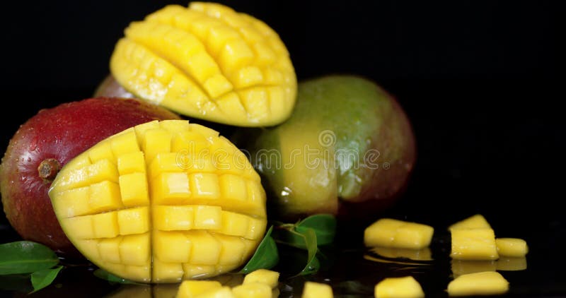 The Mango Slices Fall on the Water Splashes. Stock Video - Video of ...