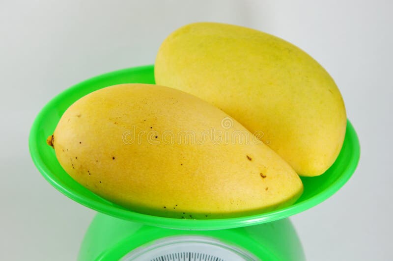 Mango Green Weighting Scale Stock Photos - Free & Royalty-Free Stock ...