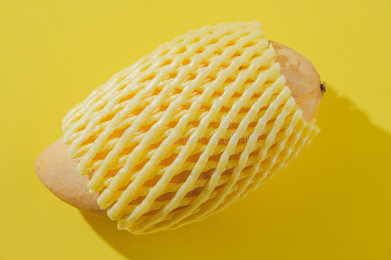 Mango Wrapped Foam Net Yellow Background Stock Photos - Free & Royalty ...
