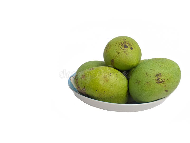 Mangoes Placed on a Glass Plate on a White Background Stock Photo ...