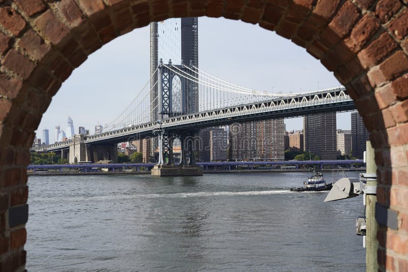 Manhattan Bridge Captured through Arches Stock Photo - Image of state ...