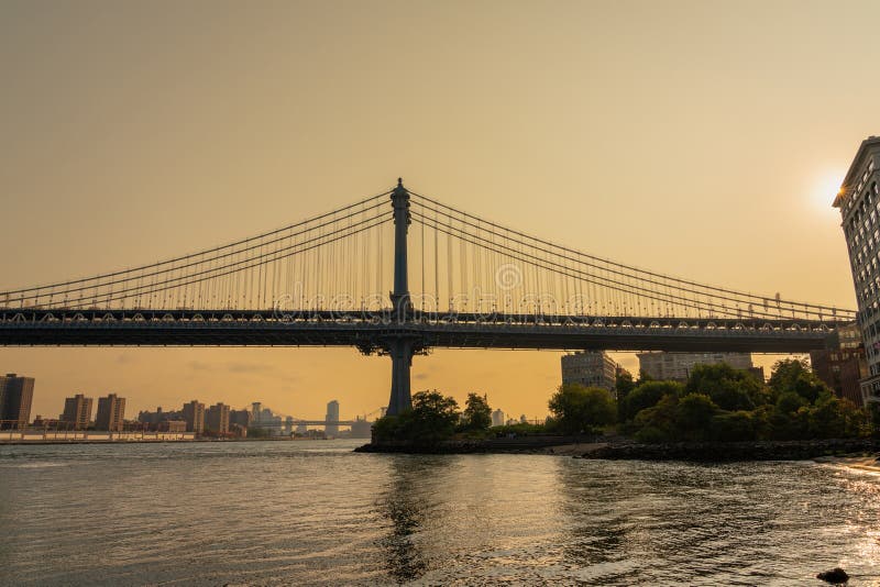 Manhattan Bridge Photo in Profile in the Tones of the Rising Sun Stock ...