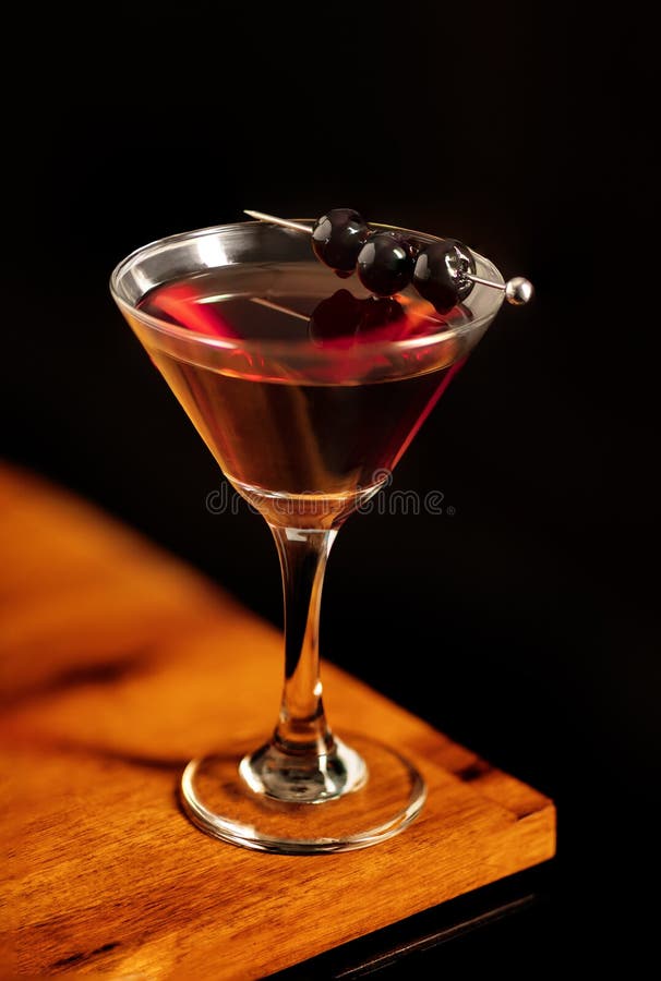 Manhattan Cocktail on Wood Table Stock Image - Image of people ...