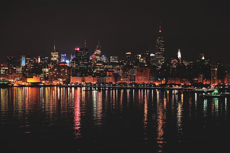Manhattan lights at night stock image. Image of reflect - 63522569