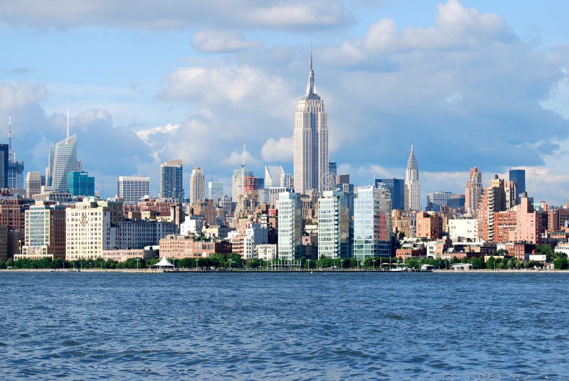Manhattan Skyline with Empire State Building Over Hudson River, NYC ... Manhattan Skyline with Empire State Building Over Hudson River, NYC ...
