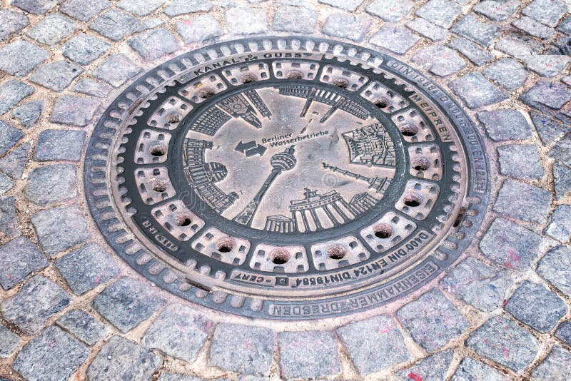 Manhole cover in Berlin editorial image. Image of tourism - 76518590