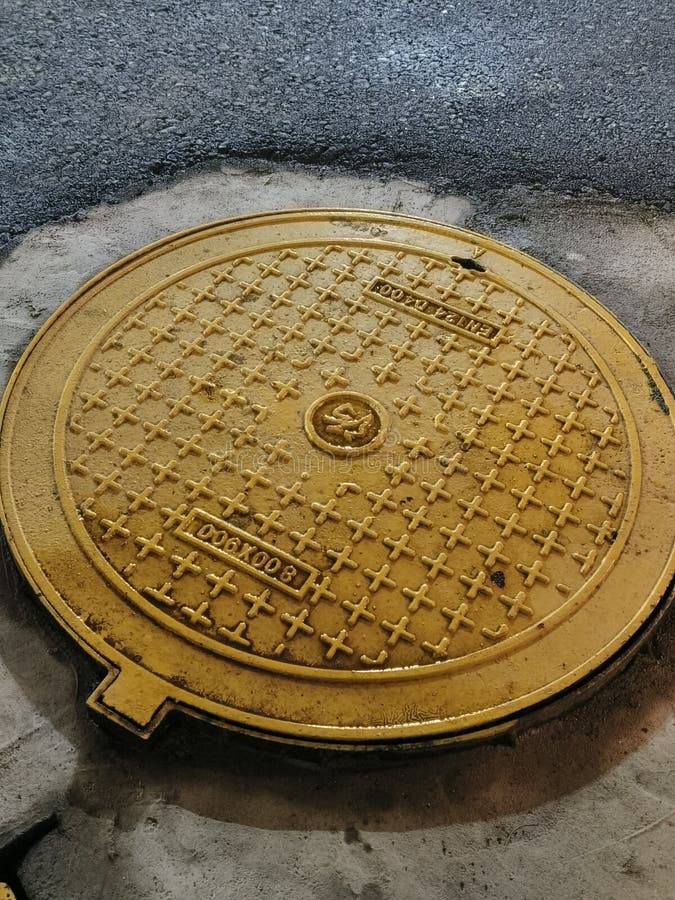 Manhole Cover Made Iron Painted Yellow Stock Photos - Free & Royalty ...