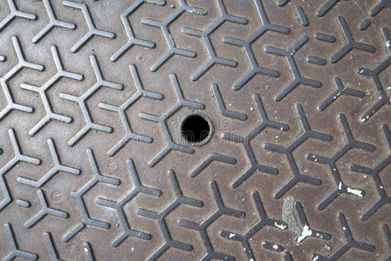 Manhole Cover Triangle Pattern Stock Photo - Image of metallic ...