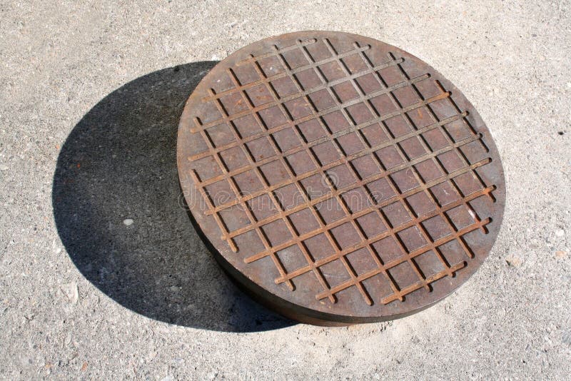 Manhole lid stock photo. Image of metal, rust, iron, pattern - 1274200