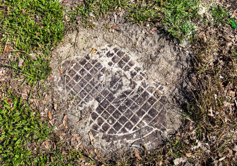 Manhole with Metal Cover Sunk into the Ground and Grass Stock Image ...