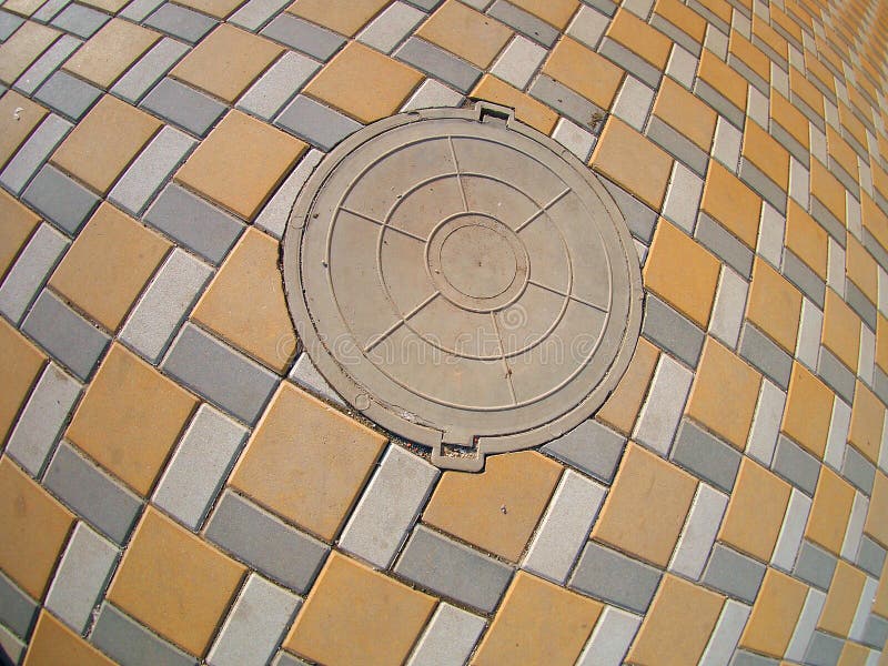 Manhole on the pavement stock photo. Image of circle - 52499724